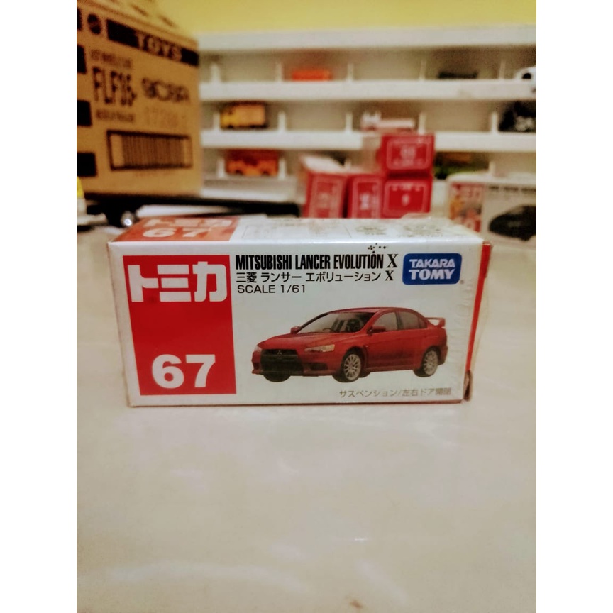 Tomica no. 67 mitsubishi lancer evolution x red no TLC land cruiser | Shopee Philippines