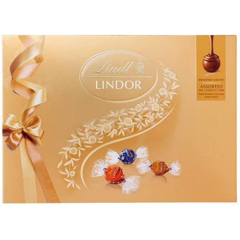Lindt Lindor Chocolate Insert The Truffle In A Beautiful Box. There Are ...