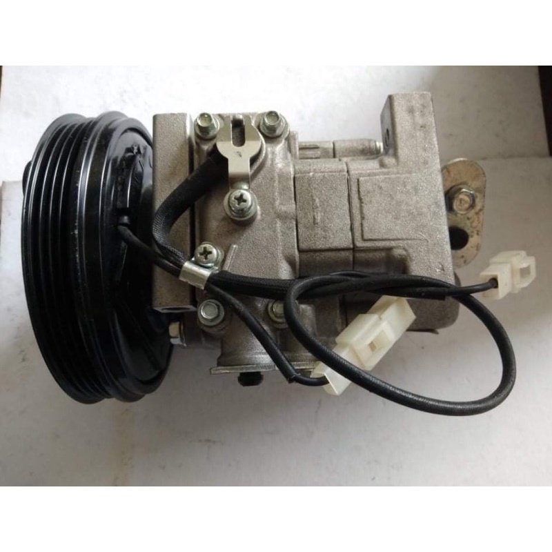 Compressor Mazda 323 Familia / Ford Lynx (4 Bolts) Panasonic | Shopee ...