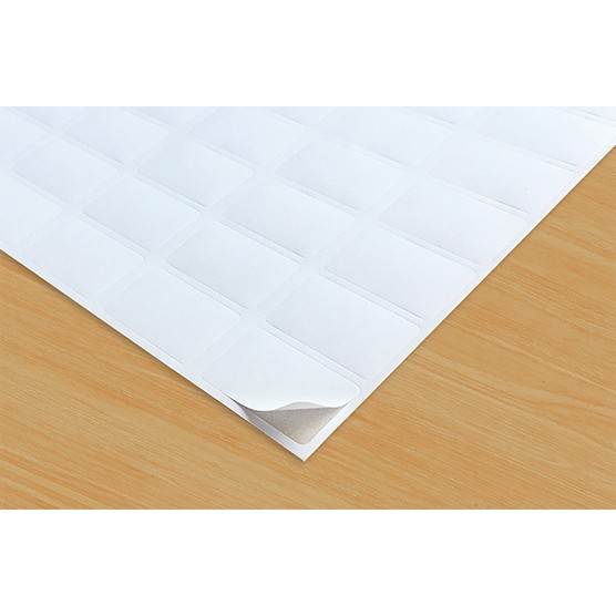 Plain white decal label with rounded corners, ready to be removed and ...
