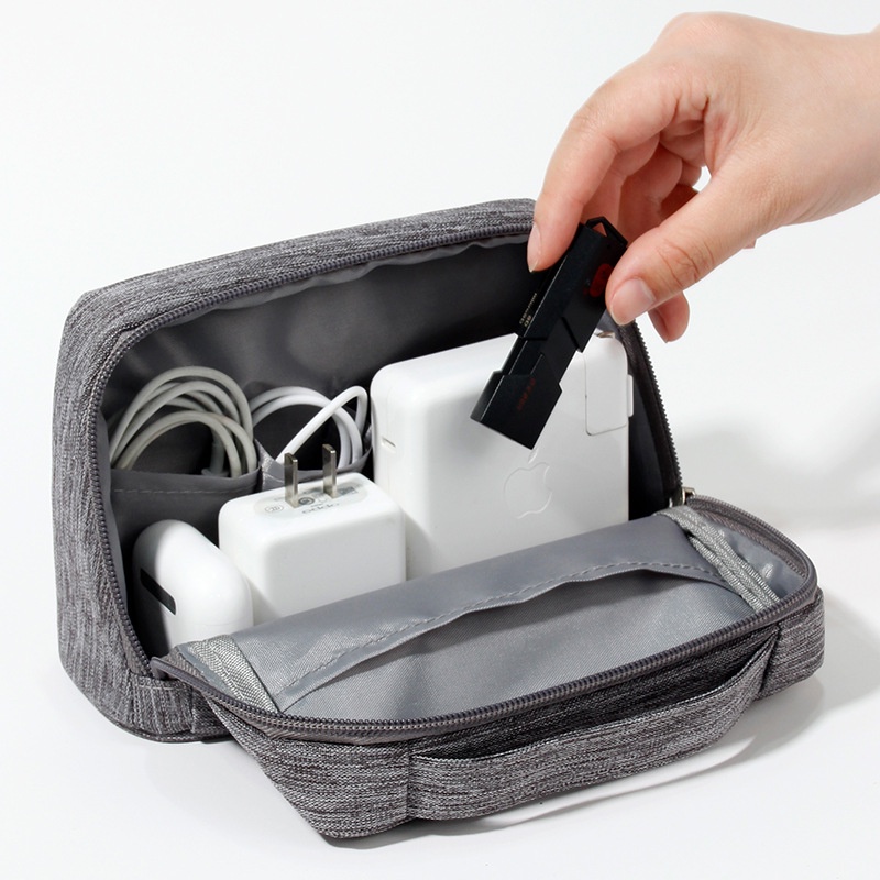 Portable hand-held data cable bag with multiple functions to hold ...
