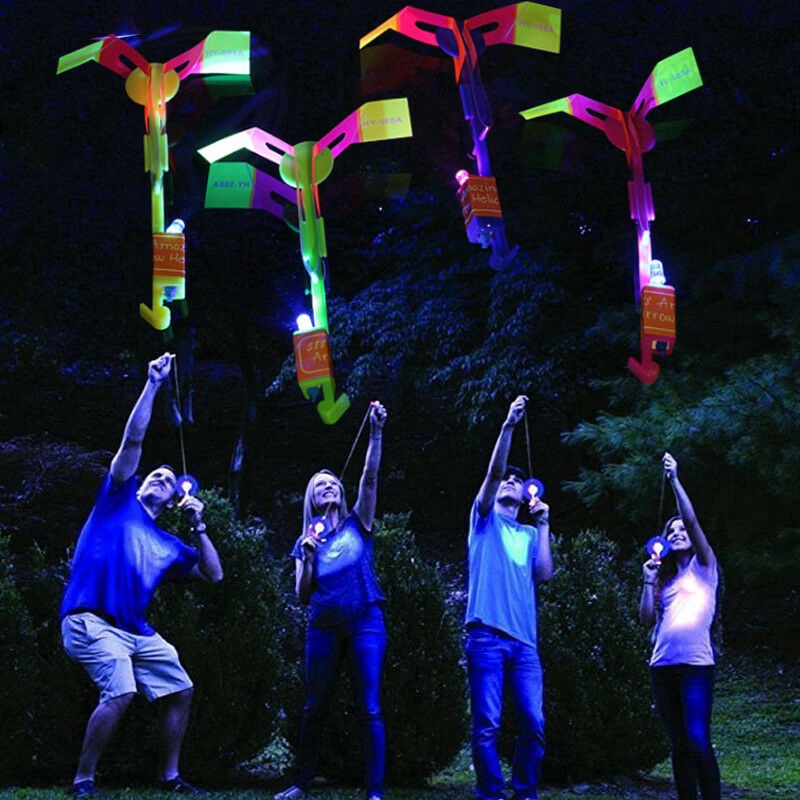 Amazing LED Light Arrow Rocket Helicopter Rotating Flying Toys Party ...