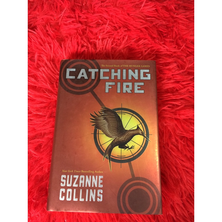 Hardbound-Catching Fire by Suzanne Collins (Hunger Games 2) | Shopee ...