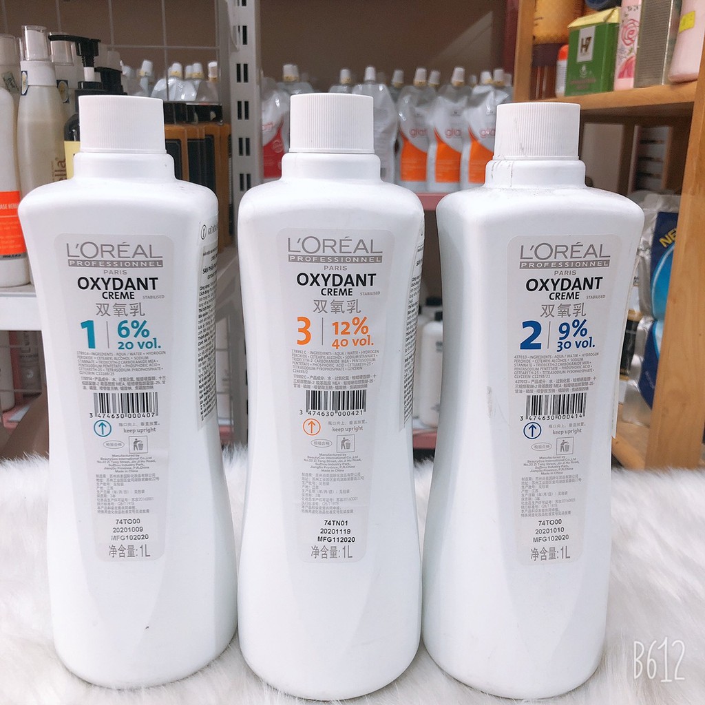 OXY Dye aid oxygen activates color particles, opens cuticles Loreal ...