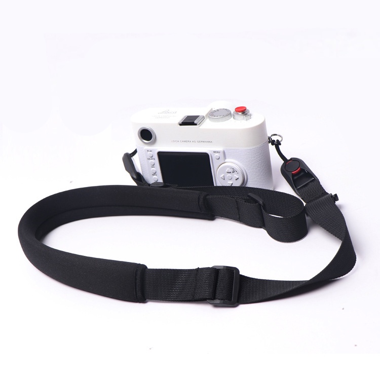 Quick-action neck camera strap uses Anchor quick-release head with ...