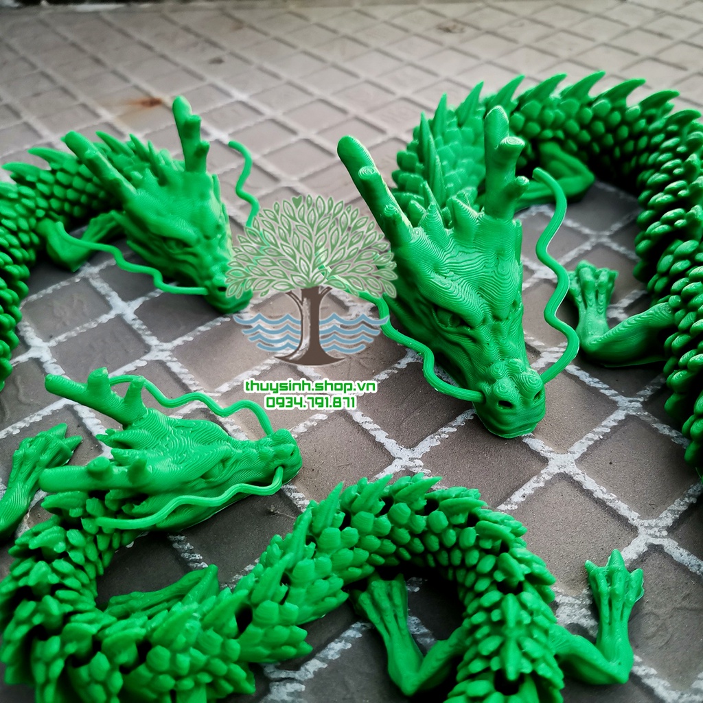 Green Dragon Model with flexible joints printed with 3D technology to ...