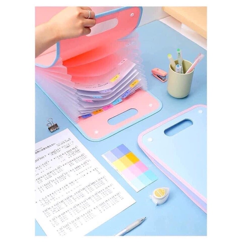 Document folder divided into many compartments for storing documents ...