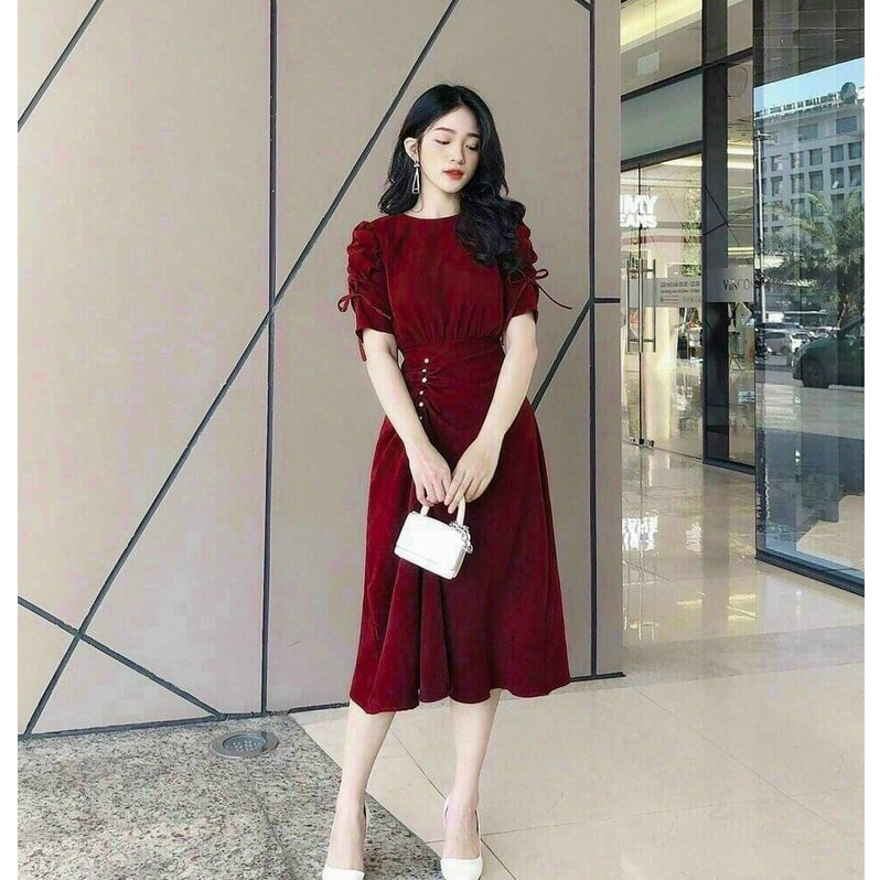 Young, luxurious red dress with round neck, puffed sleeves and ...