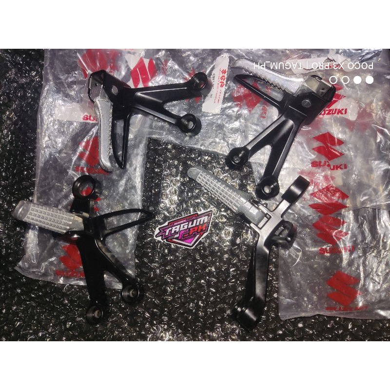 rear footrest raider carb and fi genuine sold as pares.(SGP). | Shopee ...