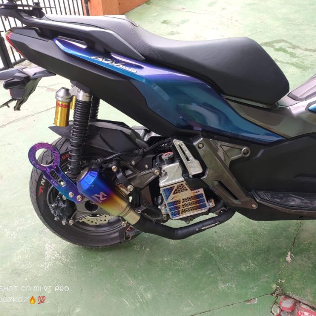 Honda ADV 150 / ADV 160 titanium radiator cover with spacer (please ...