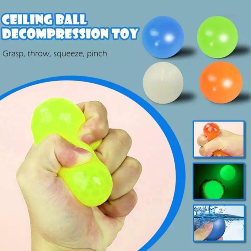 Fidget Wall Sticky Ball Glow in the Dark Ball Toy attached to the sky ...