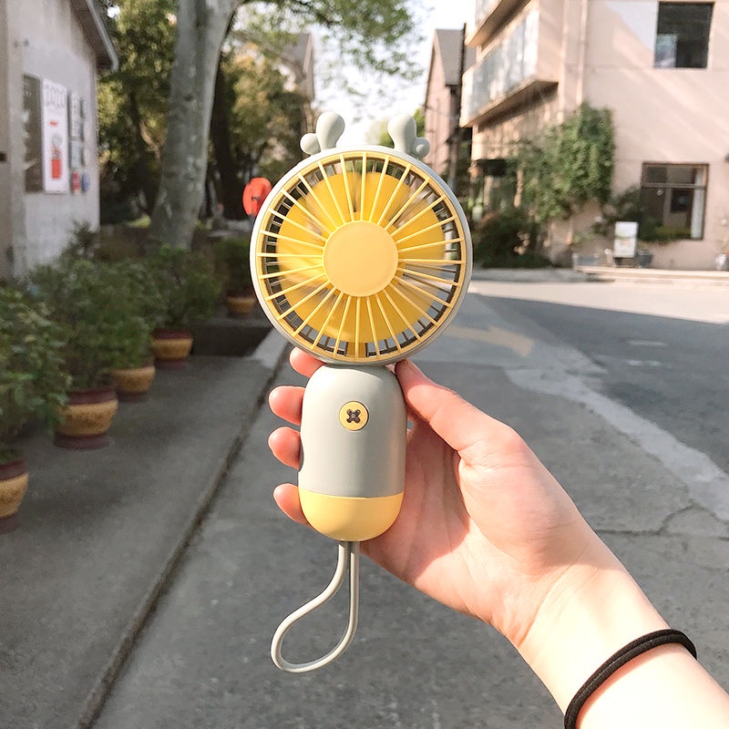 Cartoon handheld small fan USB chargingCartoon Small Handheld ...