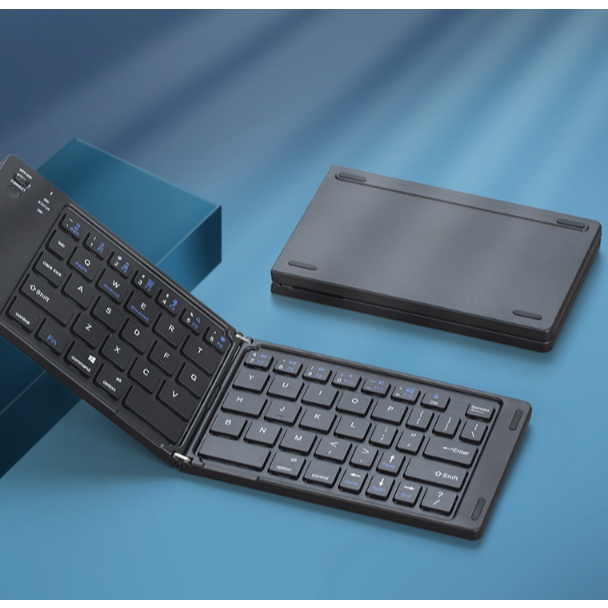 New two-fold portable mini Bluetooth keyboard charging office keyboard ...