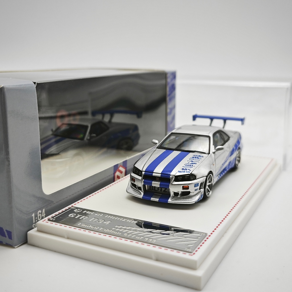 Focal Horizon FH 1 64 Skyline GT-R R34 FNF C-West Silver Blue Diecast ...