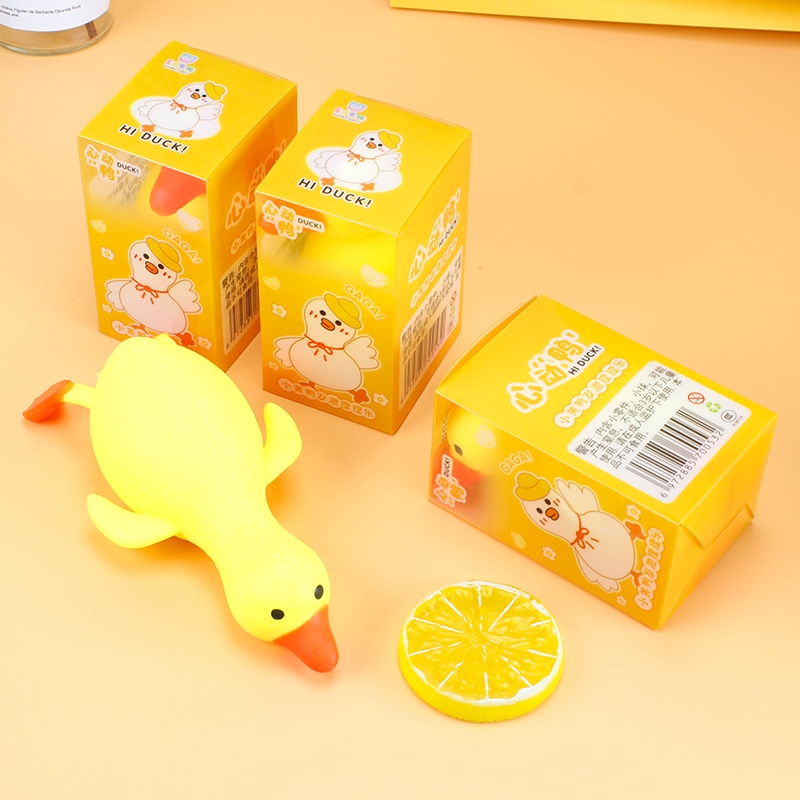 Yellow Laying Down Duck Squishy Toy - Cute Relaxing Duck for Stress ...