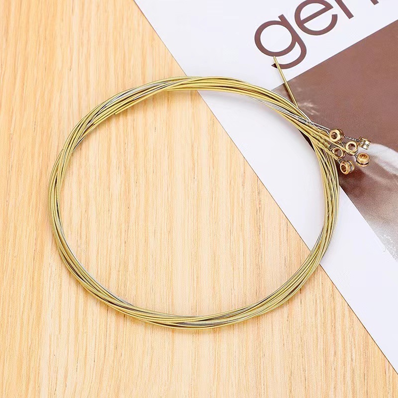 Guitar strings folk music wooden guitar brass red copper color strings ...