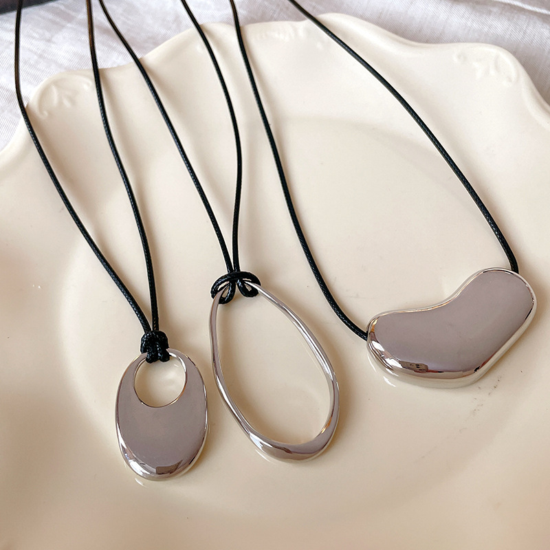 Simple leather rope irregular love pendant necklace personality punk ...
