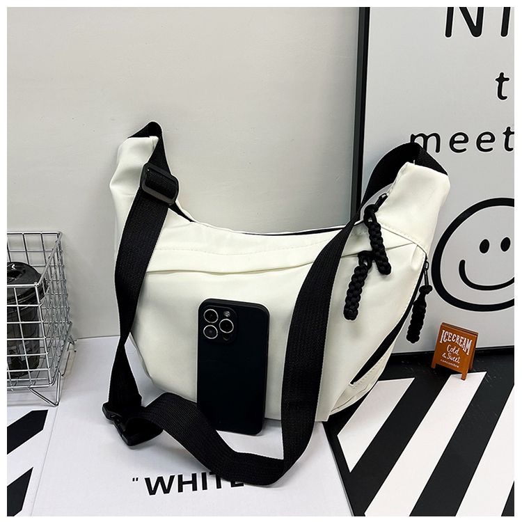 Black Men's canvas bag, casual dumpling bag, high-end texture ...