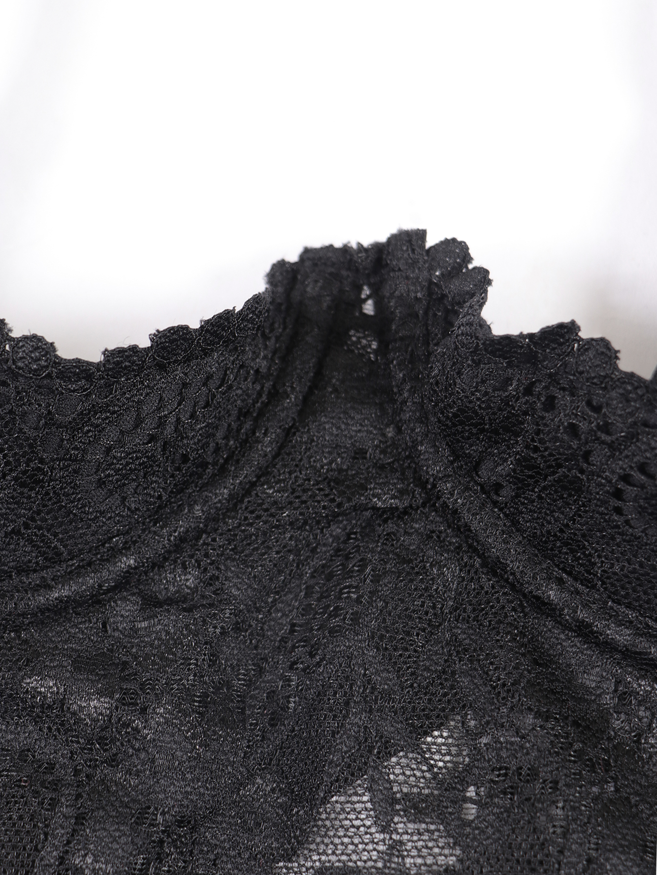 A quarter cup bra set with lace that lifts and gathers, designed to ...