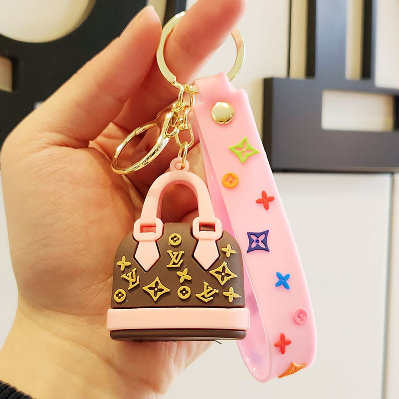 Luxury genuine leather mini bag keychain for women; exquisite and ...