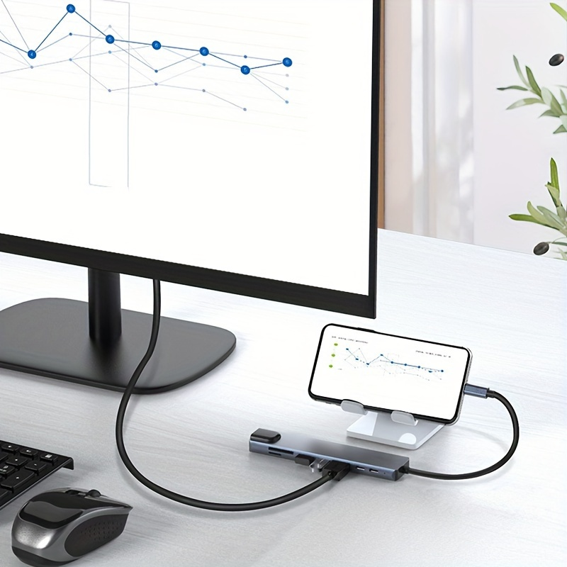 Eight-in-one docking station with Type-C, 100Mbps Ethernet port, USB ...