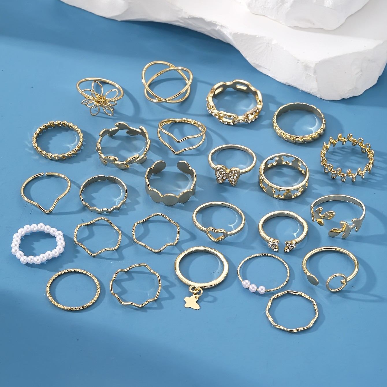 Golden 25 Piece Ring Set with Butterfly Pearl and Floral Designs for ...