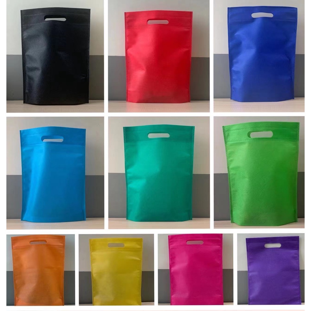 50 Pcs Flat Eco Bag 4 Sizes 10 Colors D Cut Pouch Plain Non-woven ...