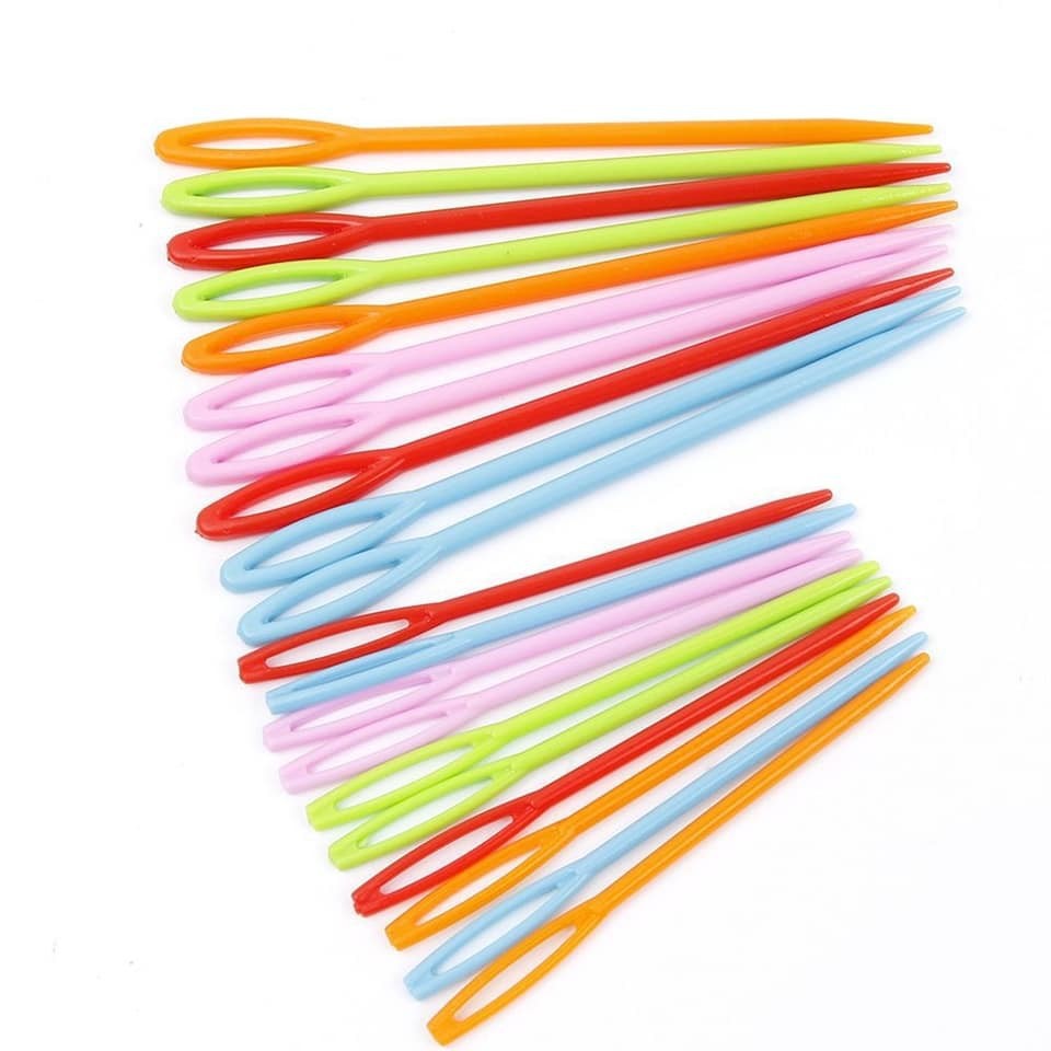 Large, safe plastic needles help children practice building ropes and ...