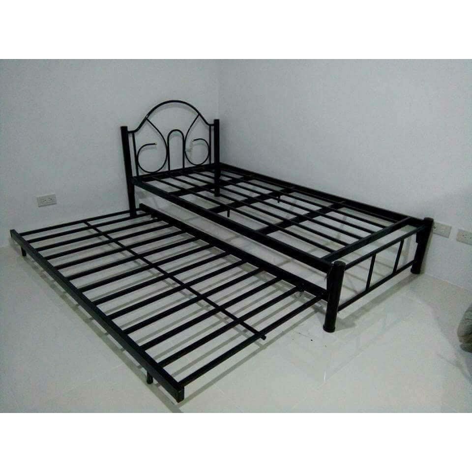 Steel bed with pull out store