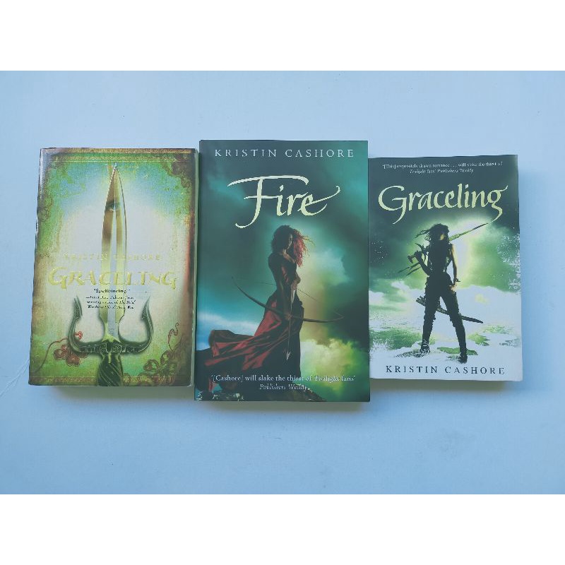 Graceling (Graceling Realm #1) and Fire (Graceling Realm #2) by Kristin ...