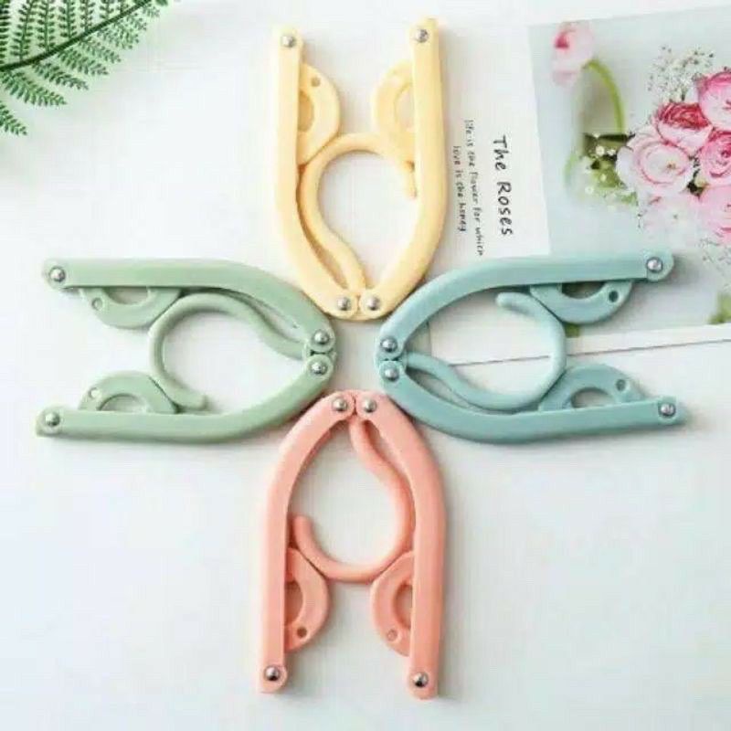 Multipurpose PORTABLE FOLDING CLOTHES HANGER SIMPLE PLAIN AND PRACTICAL ...