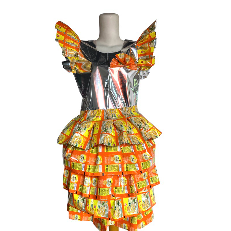 Recycled costumes made from used plastic to wrap food for girls' snacks ...