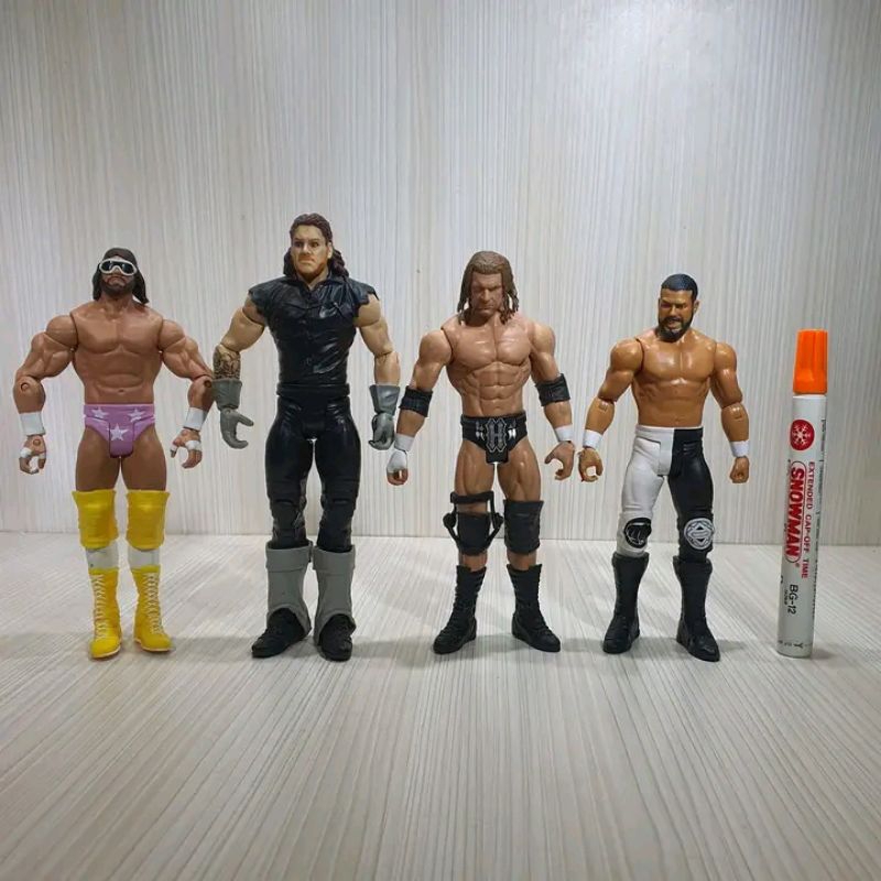 Wwe figure macho man undertaker triple H andradewwe wrestling ...