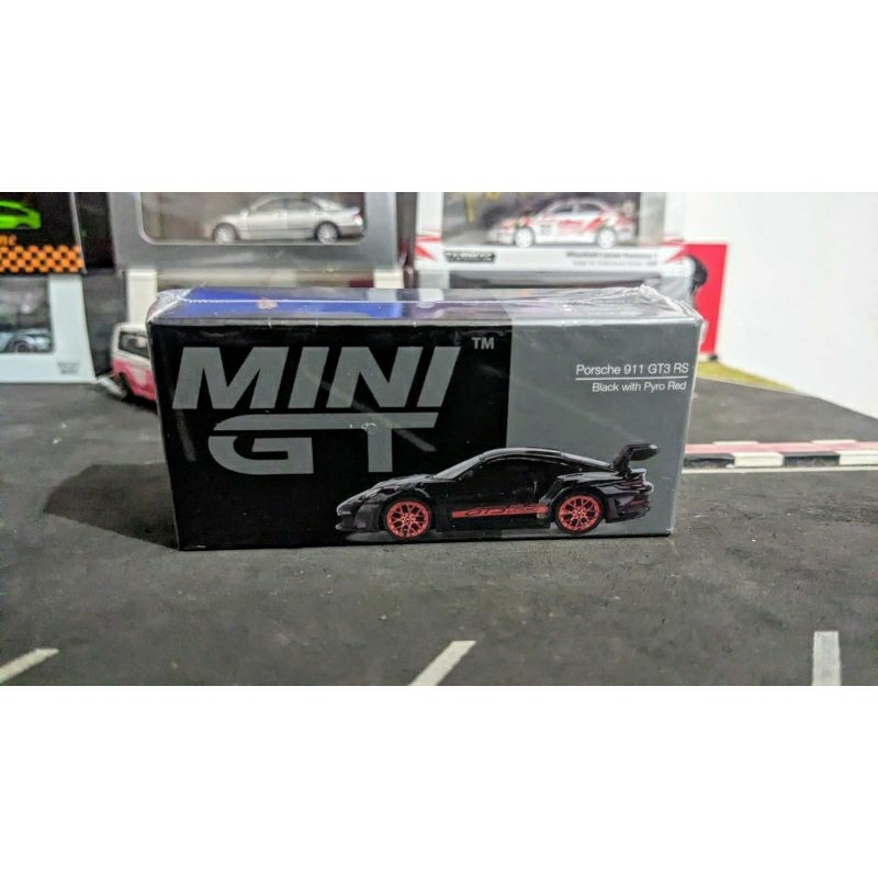 Diecast Mini GT Porsche 911 GT3 RS Black with Pyrp Red no. 681 Seal ...