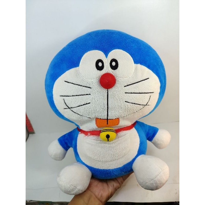 Original uk doraemon doll large minus necklace | Shopee Philippines
