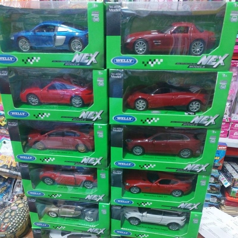 NEW FAMILY TOYS DIE CAST WELLY ORIGINAL DIECAST OPEN DOOR TOYOTA INNOVA ...