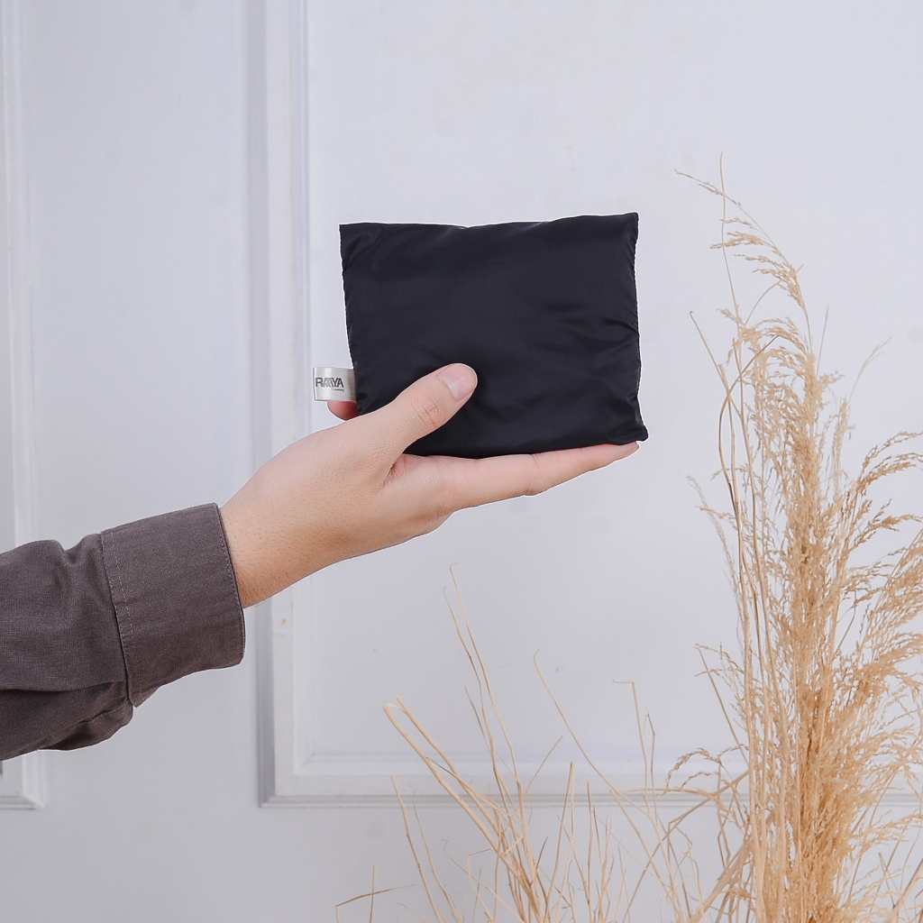 HITAM Simple and small instant travel cover that can fit in a black ...