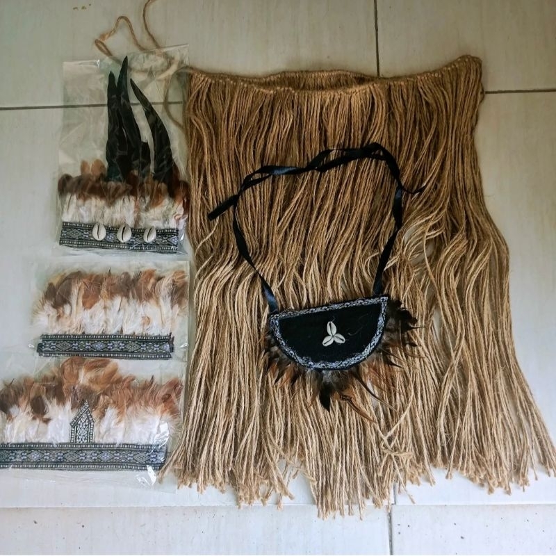 A Set Of Traditional Outback Papuan Costumes For Adults And Children ...