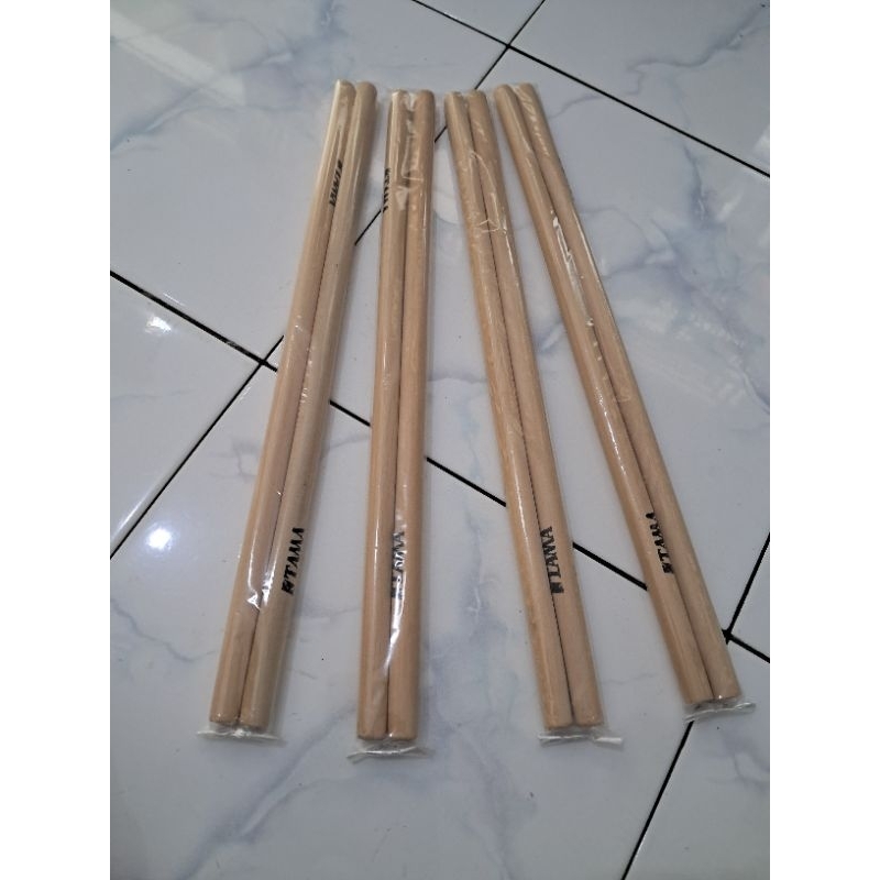 A pair of pound fit wooden gymnastics sticks 40 cm long and 60 cm ...
