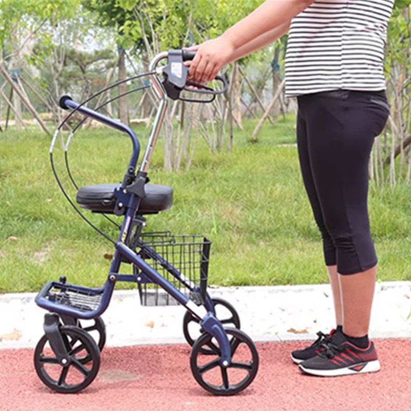 Elderly person with a sitting handcart, mobile walking aid, foldable ...