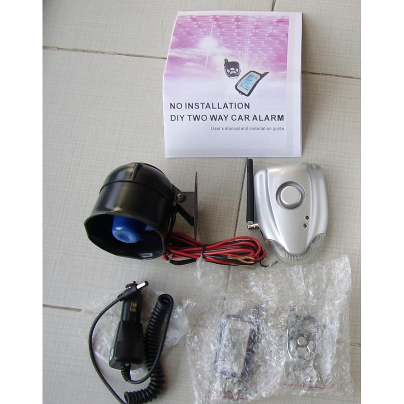 Wireless car alarm system with shock sensor and air pressure sensor and ...