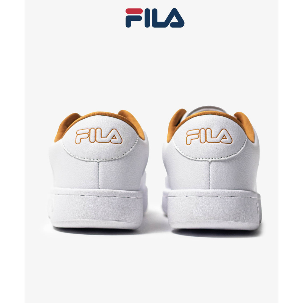 Fila white and gold store