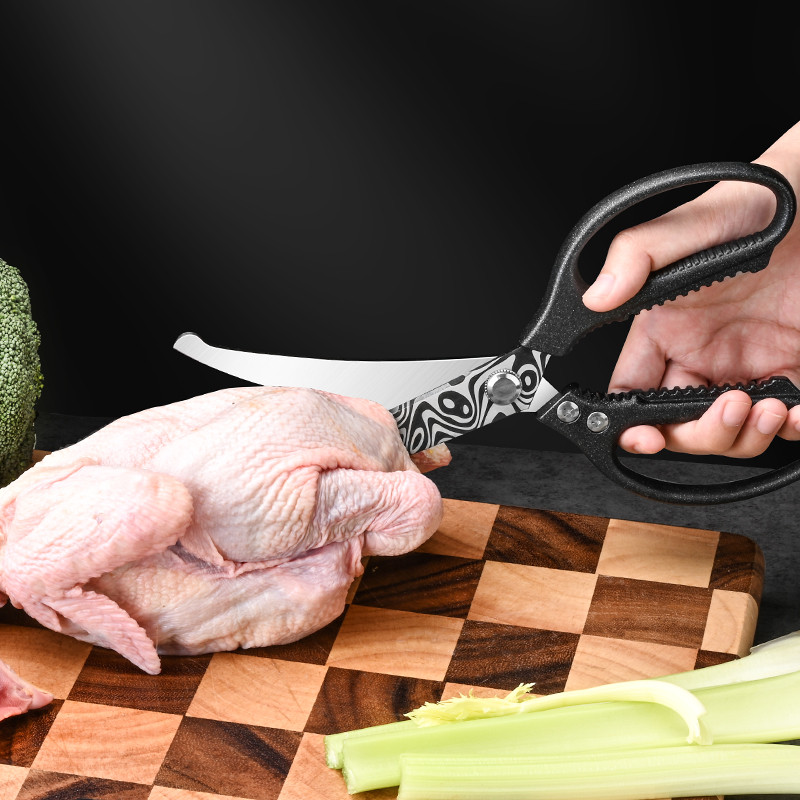 A Household all-steel black leopard print kitchen scissors with ...