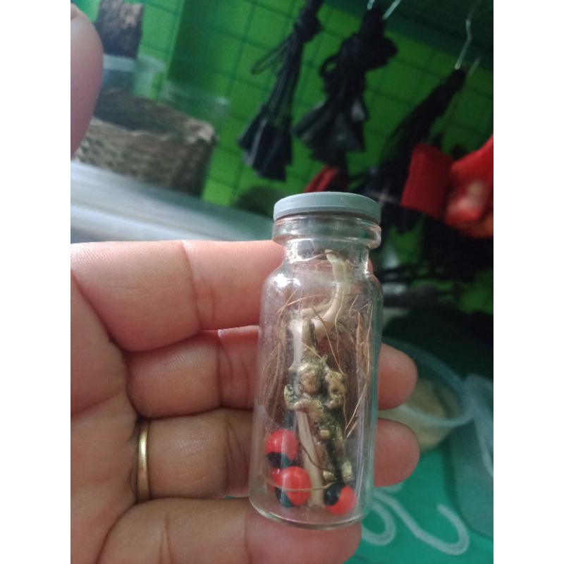 Niño hubad in bottle with tagupaypay at wishing root blessed and ...
