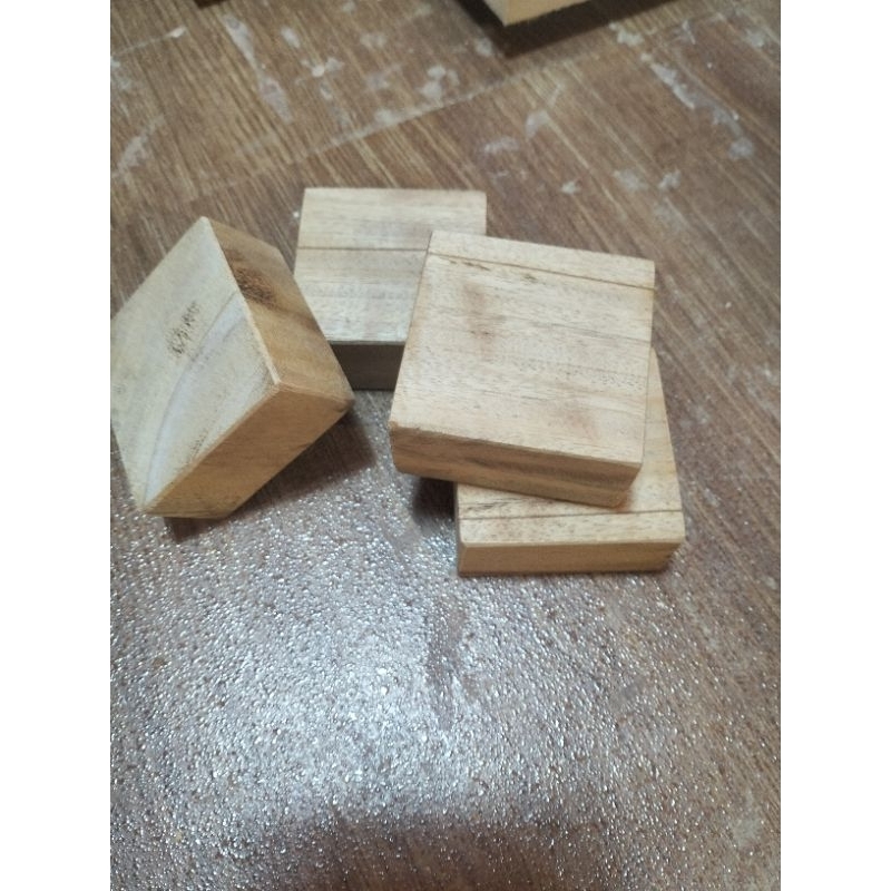 Wooden blocks..7 cm by 7 cm by 4 cm..made from solid wood. smooth on ...