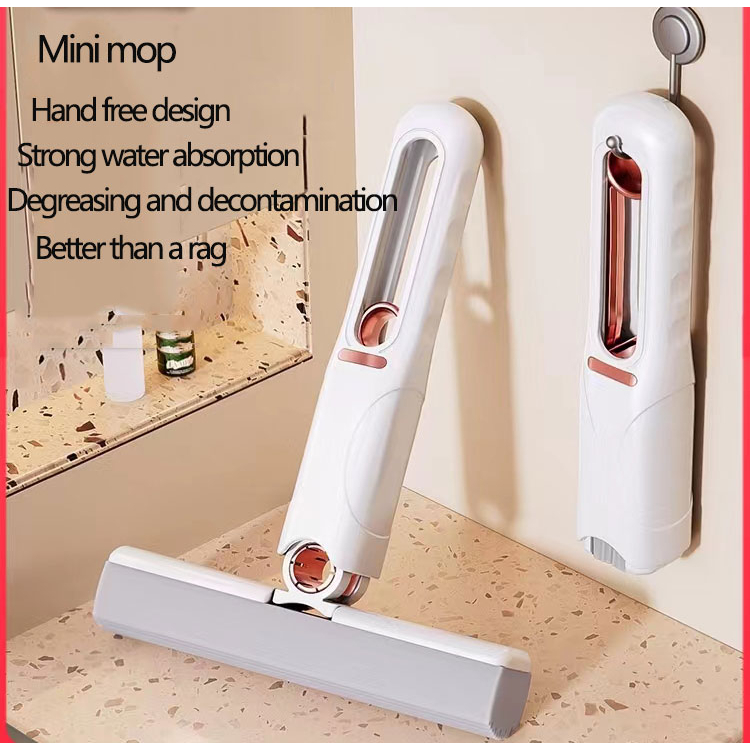 Household Mini Mop A mop clean sponge absorbs water and holds a hands ...