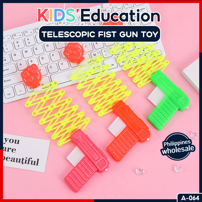 Telescopic fist gun toy Weird Toys for kids Spring gun tricky toy Prank ...