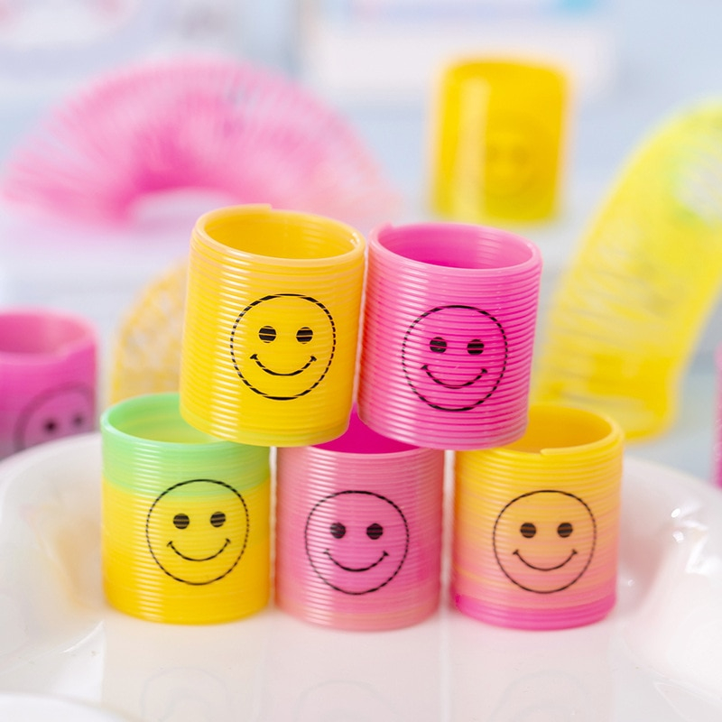 12Pcs magic spring toy rainbow mini smiley Educational Toys / Lootbag ...