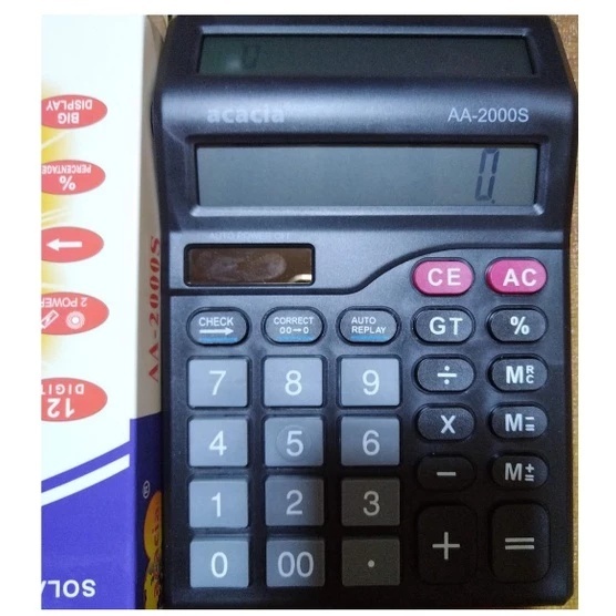 Solar powered double-sided calculator with large 12-digit screen, 2000s ...