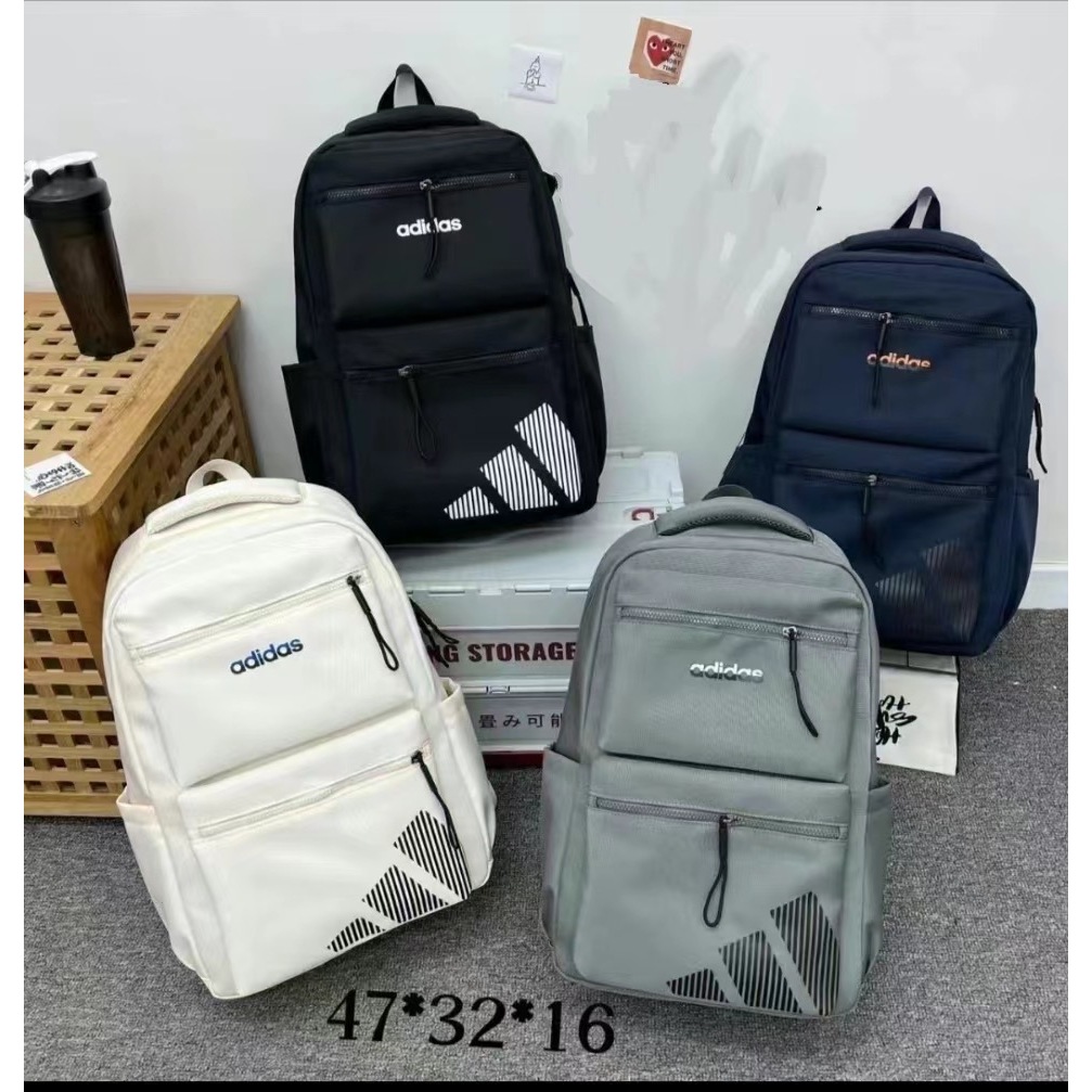 Fashion couple student backpack large capacity many pockets | Shopee ...